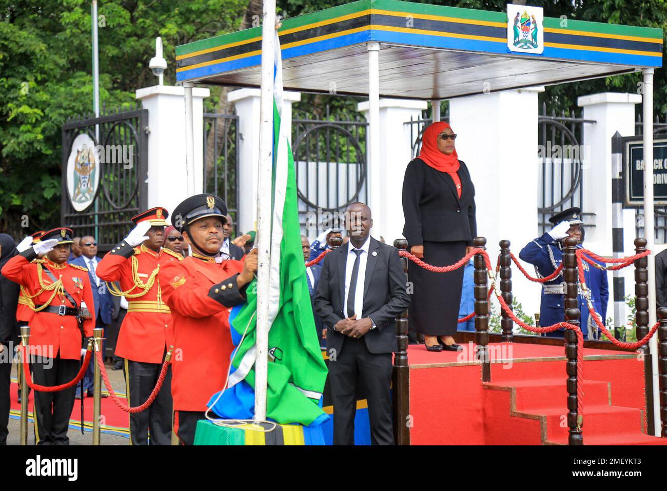 Tanzania's new president Samia Suluhu Hassan, right, is sworn in at a ceremony at State House in ...