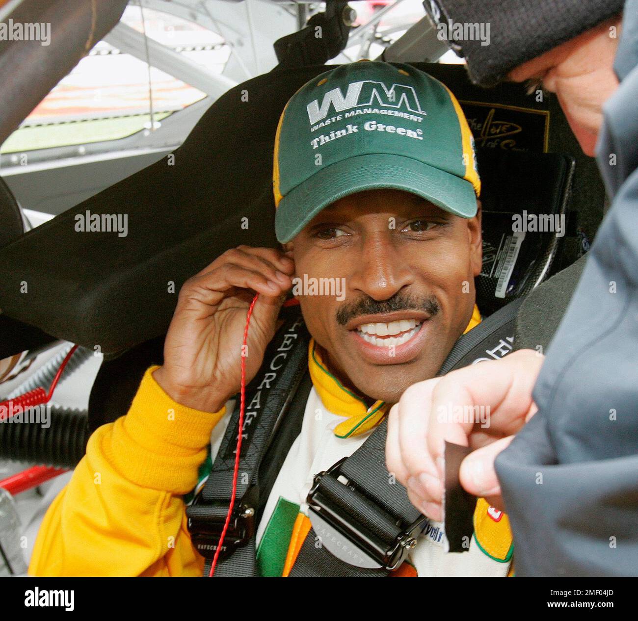FILE - NASCAR driver Bill Lester gets ready for a rain delayed start of ...