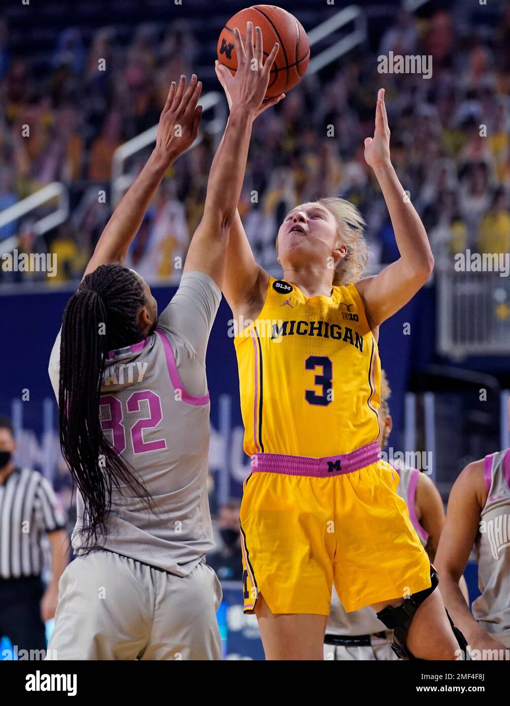 Michigan guard Maddie Nolan (3) shoots over the defense of Ohio State ...