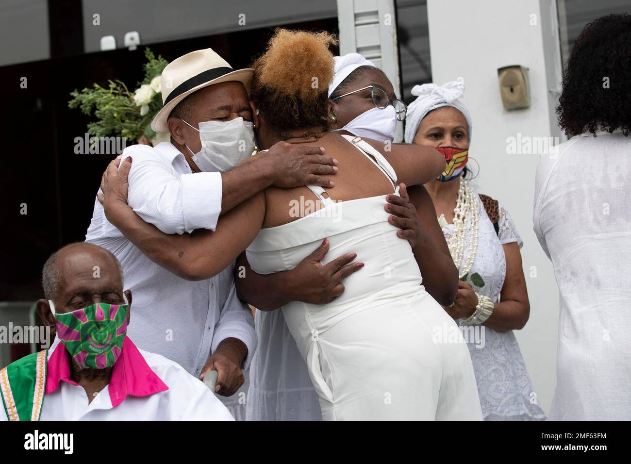Members of a samba school hug each other during a symbolic Carnival ...