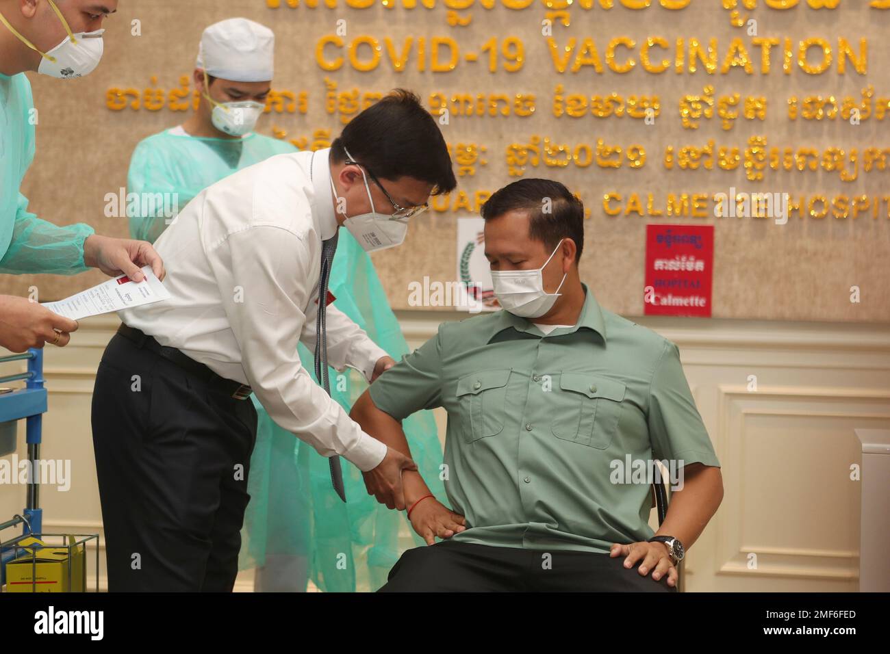 Cambodia's Lt. Gen. Hun Manet, right, a son of Prime Minister Hun Sen ...