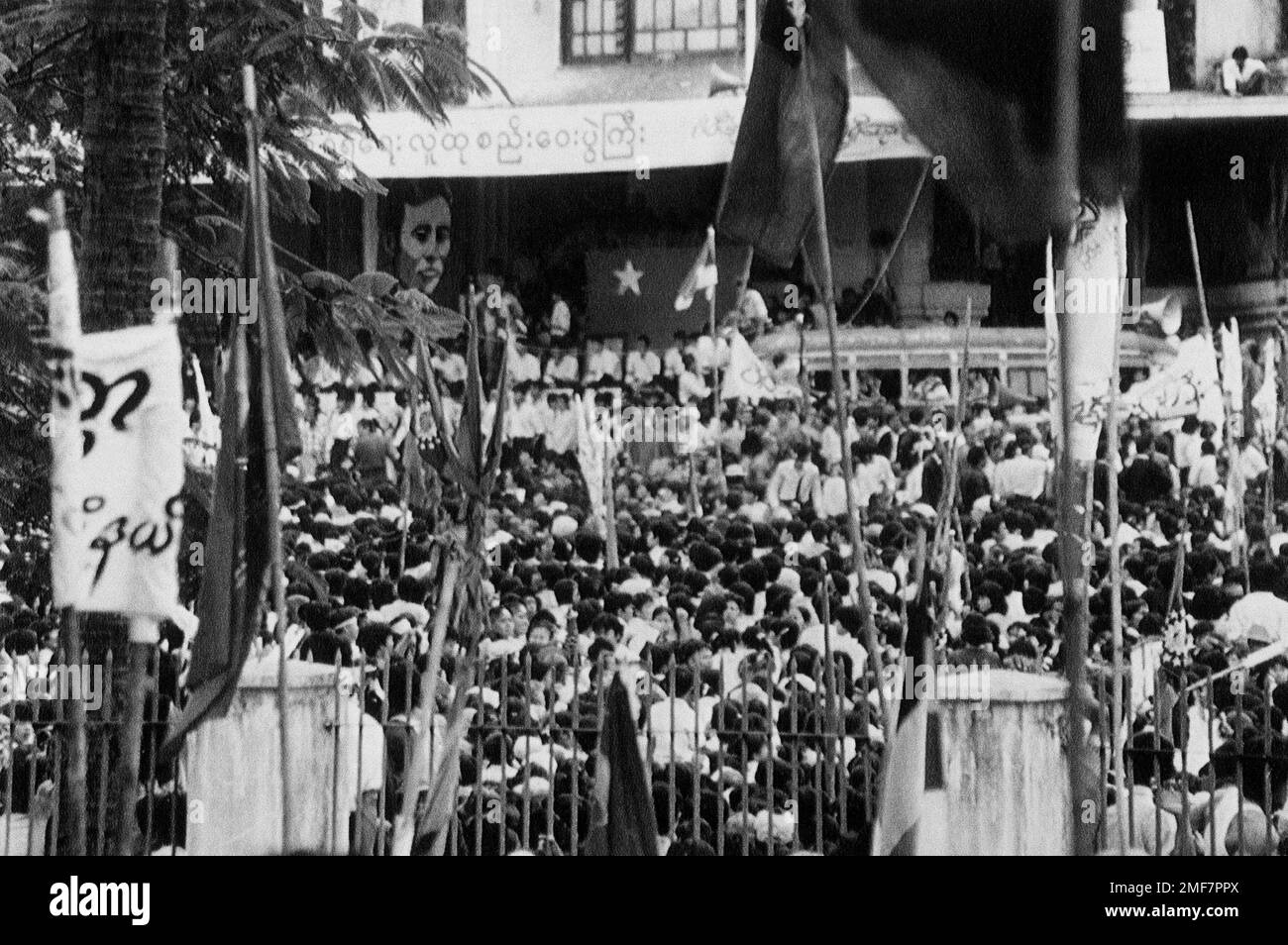 FILE - In this Aug. 27, 1988, file photo, people gather to listen to ...