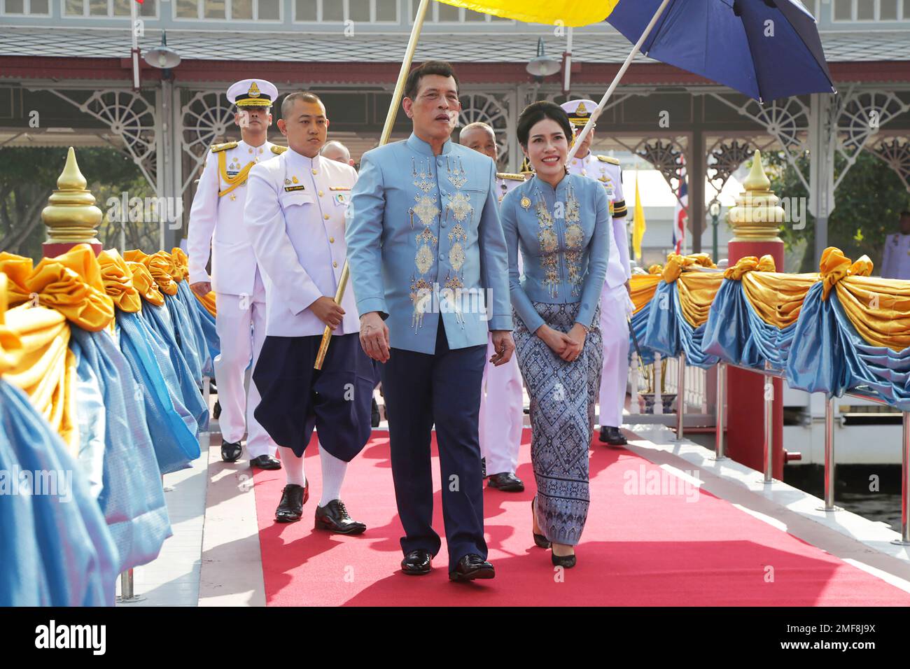 Thai King Maha Vajiralongkorn, center, and his royal noble consort ...