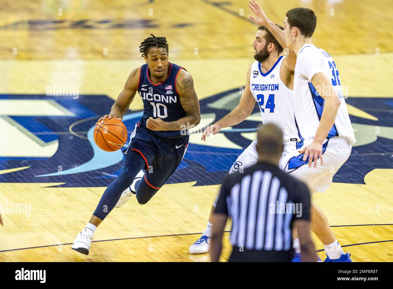 Connecticut guard Brendan Adams (10) drives to the basket against ...
