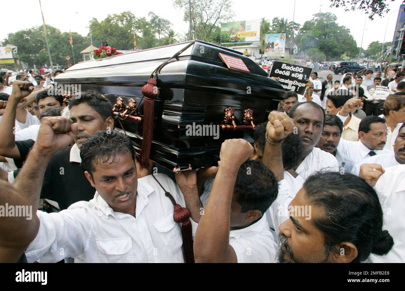 FILE - In this Monday, Jan. 12, 2009, file photo, Sri Lankans shout ...