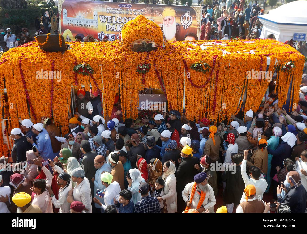 Sikh pilgrims attend a religious festival to celebrate the birth ...