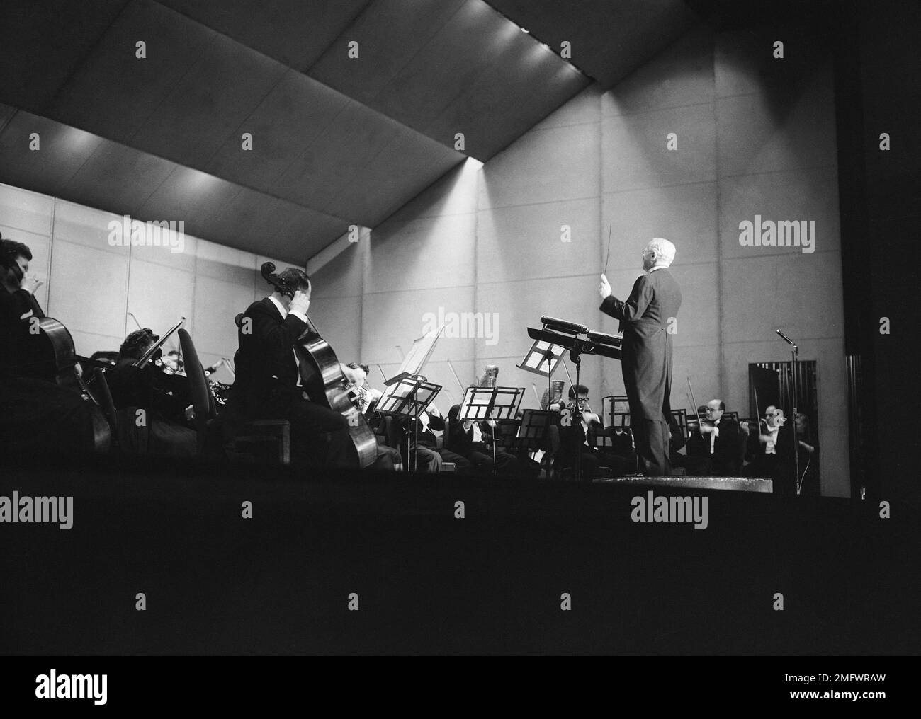 Former President Harry S. Truman stands at the podium leading the ...