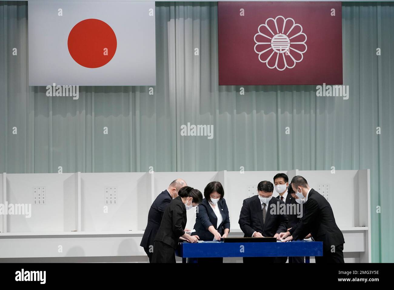 Officials count ballots at the Liberal Democratic Party's (LDP ...