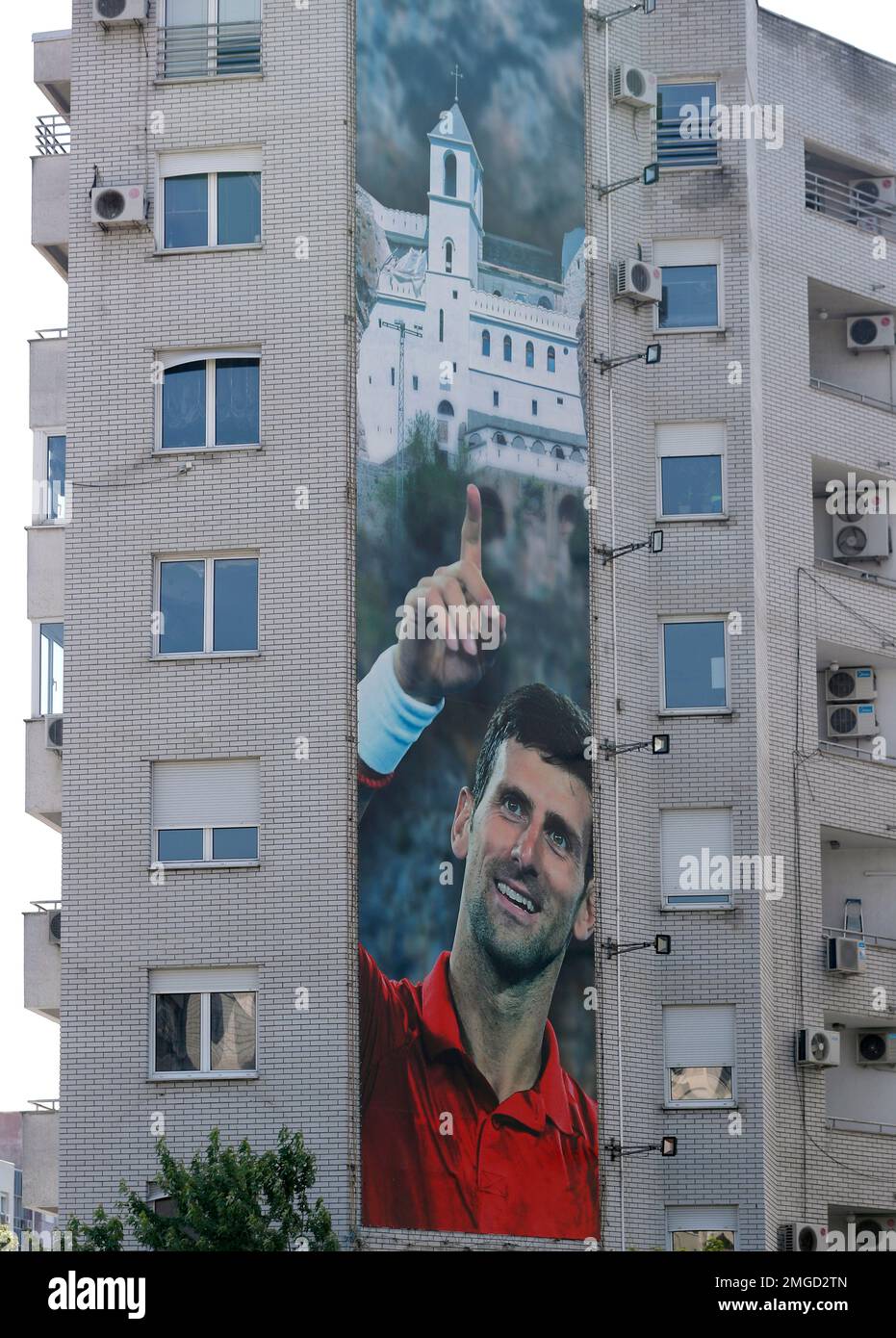 A billboard depicting Serbian tennis player Novak Djokovic and the ...