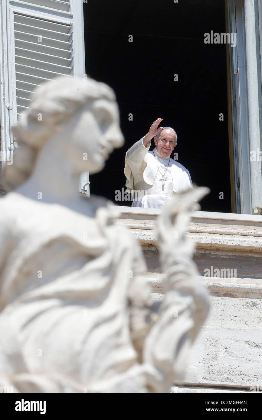 Pope Francis delivers his blessing from the window of his studio ...
