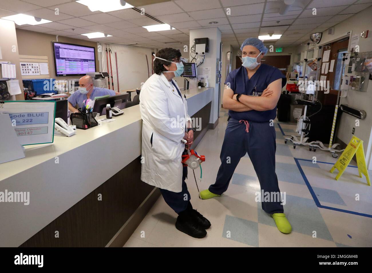 Dr. Eileen Bulger, left, chief of trauma, talks with Dr. Sam Mandell, a ...