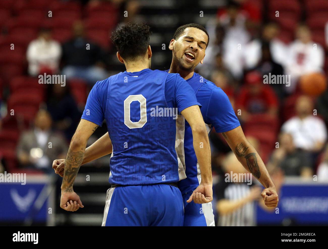 Air Force's Ryan Swan-Ford (34) celebrates with his teammate Caleb ...