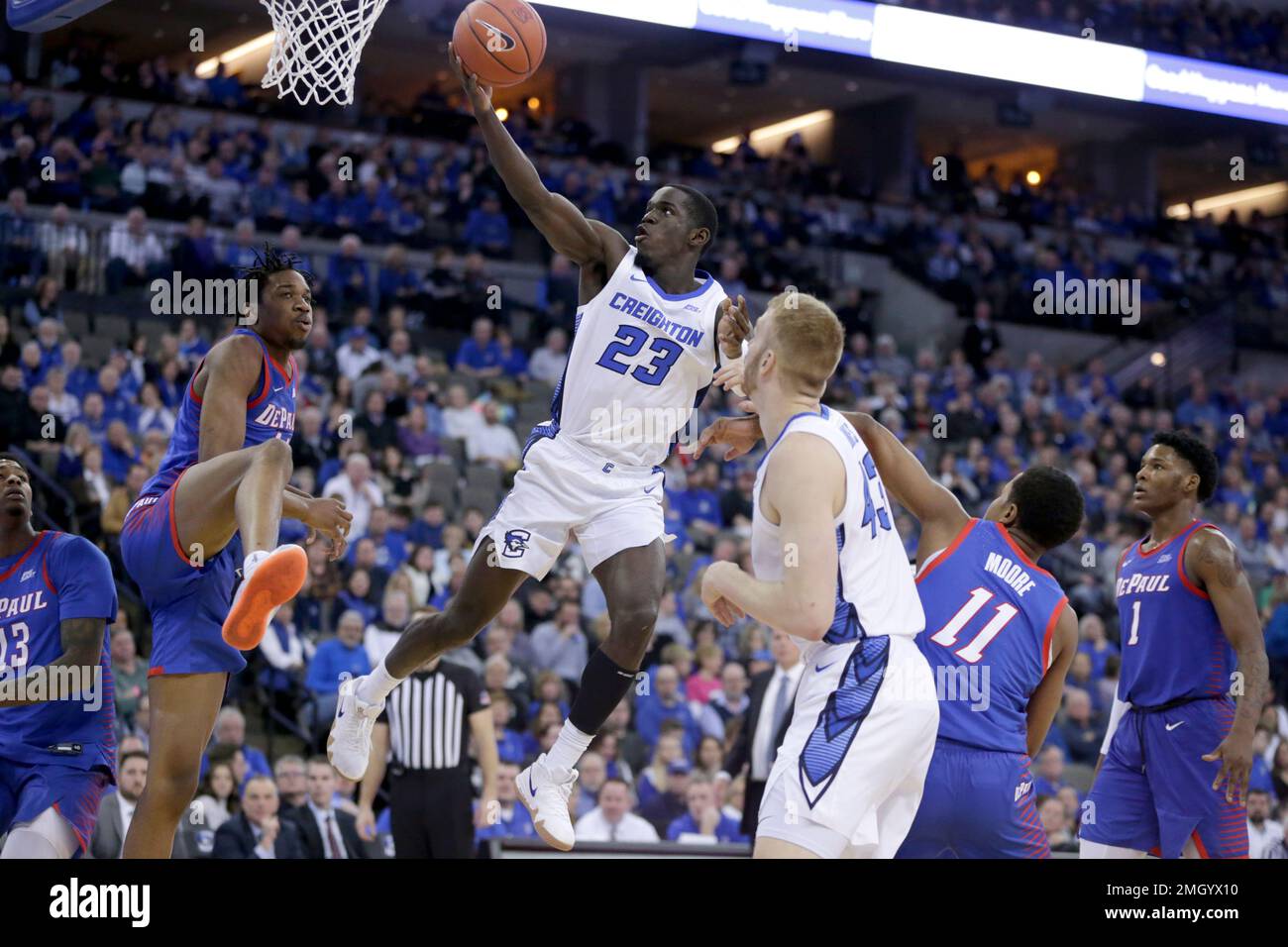 Creighton's Damien Jefferson (23) goes to the basket against DePaul's ...