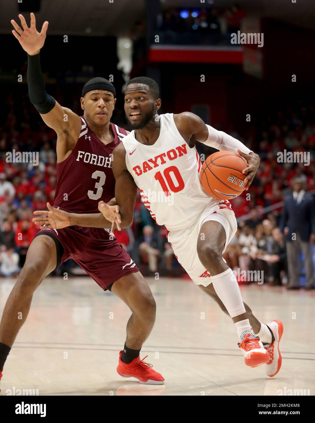 Dayton's Jalen Crutcher (10) drives to the basket against Fordham's ...