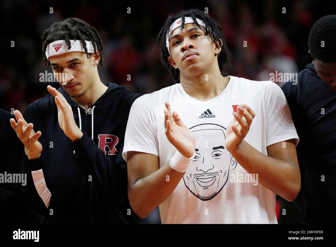 Rutgers guards Caleb McConnell, left, and Ron Harper Jr., applaud ...