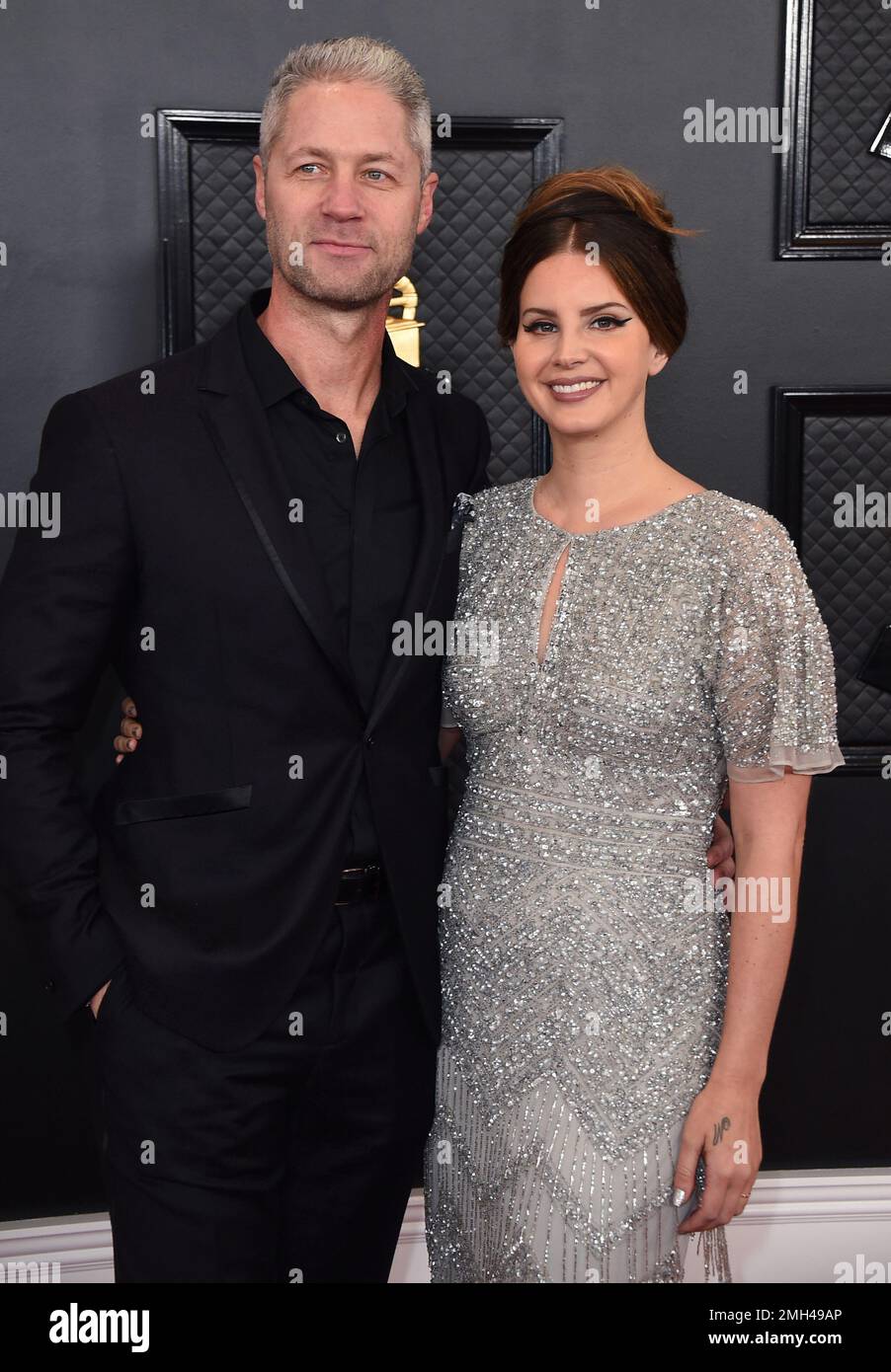 Sean Larkin, left, and Lana Del Rey arrive at the 62nd annual Grammy ...