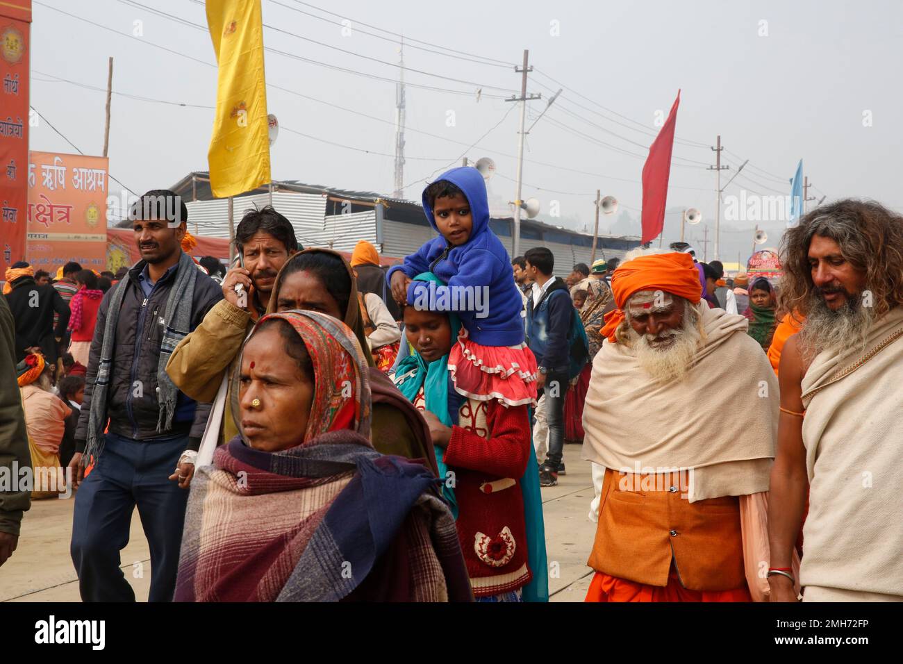Hindu devotees arrive to take a holy dip at Sangam, the confluence of ...