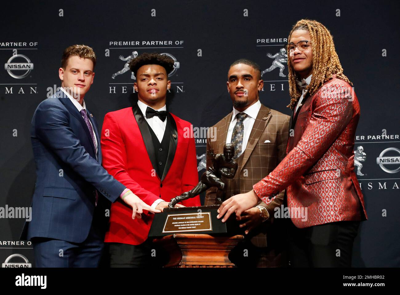NCAA college football players and Heisman Trophy finalists, from left ...