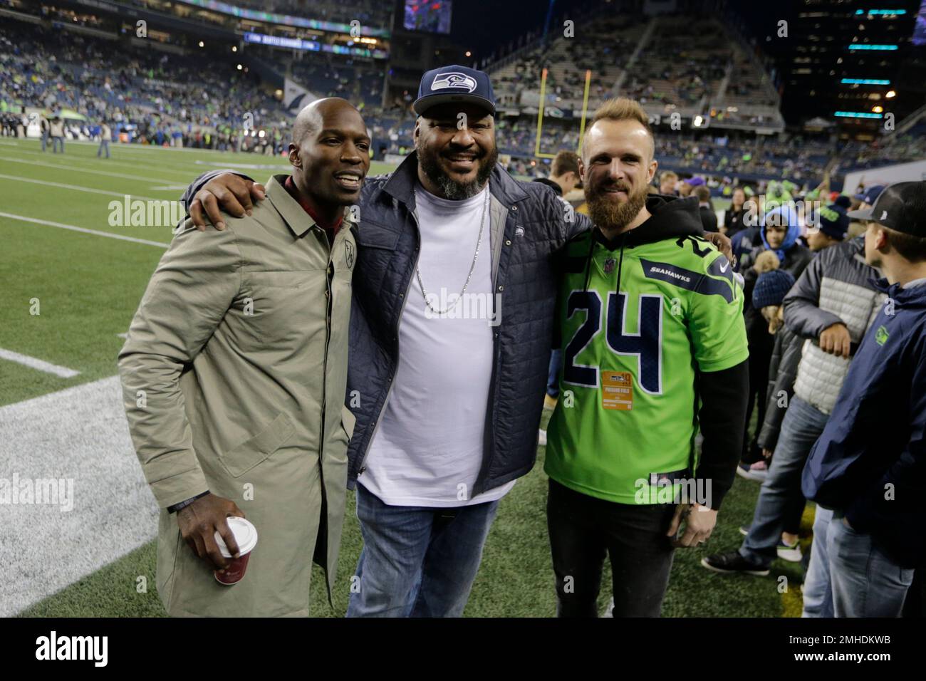Former NFL football players Chad Ochocinco, left, and Walter Jones ...