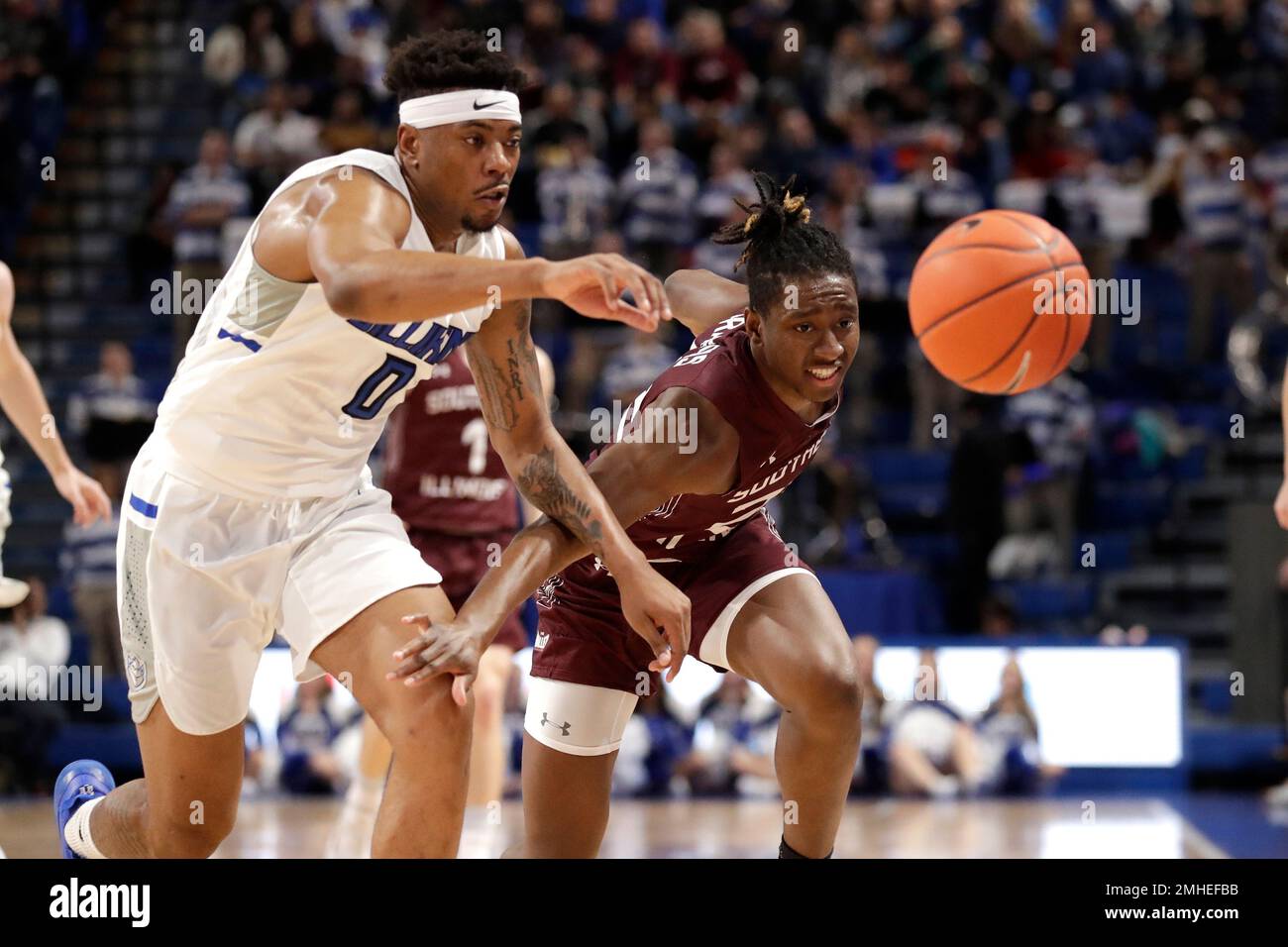 Southern Illinois' Harwin Francois, right, and Saint Louis' Jordan ...