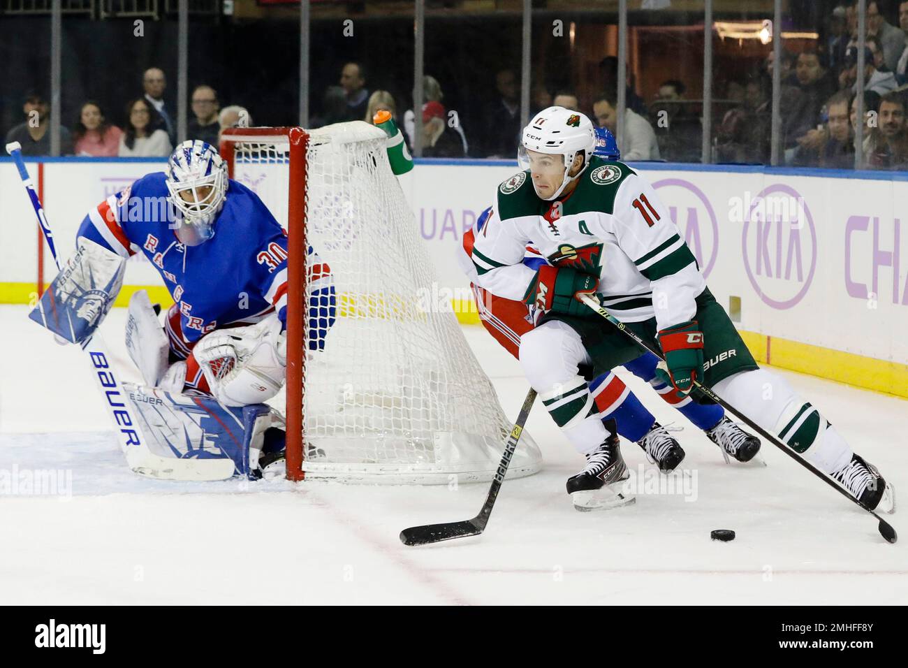 New York Rangers goaltender Henrik Lundqvist (30) watches Minnesota ...