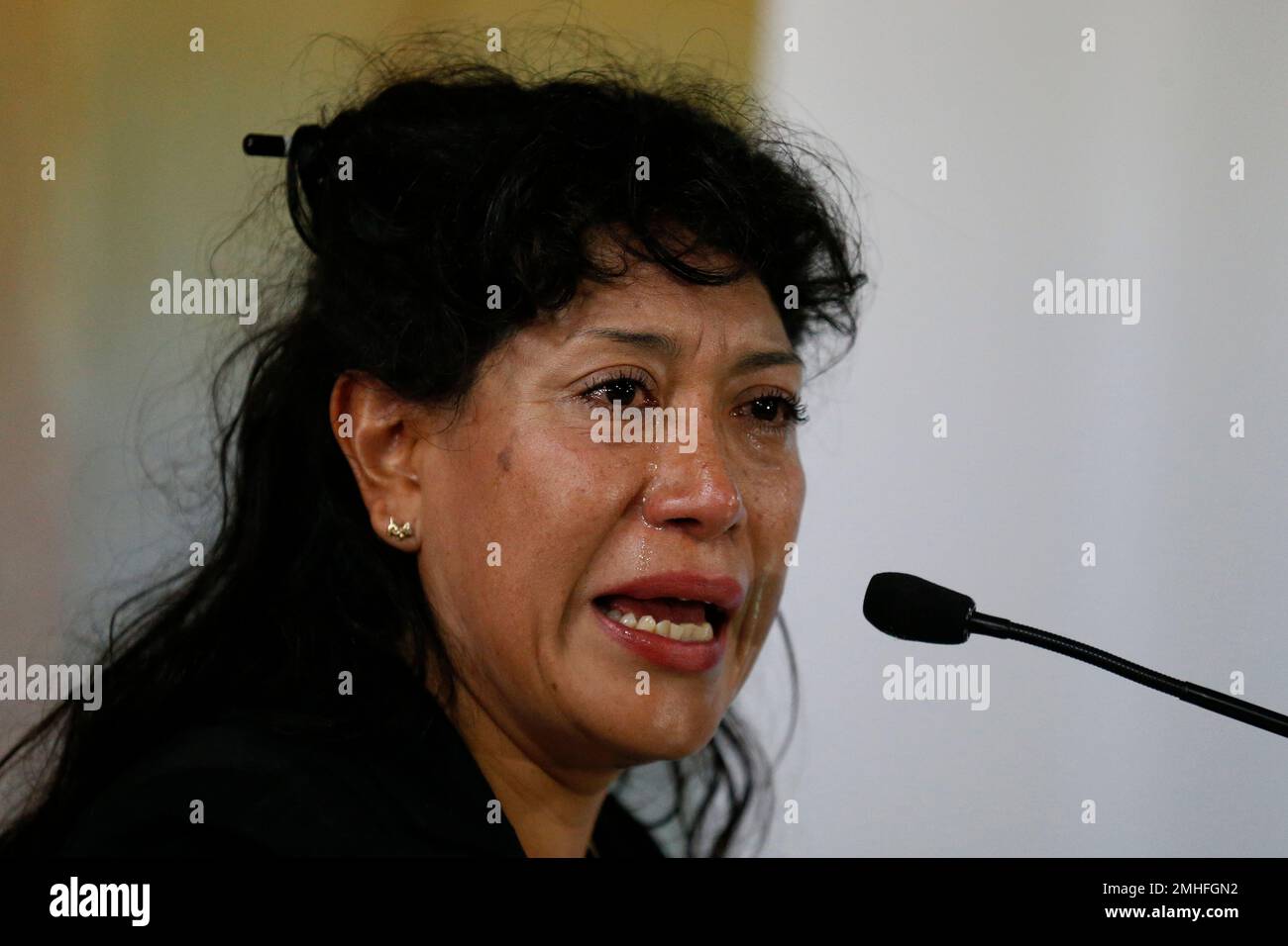 Araceli Osorio Martinez, mother of Lesvy Berlin Osorio, weeps as she ...