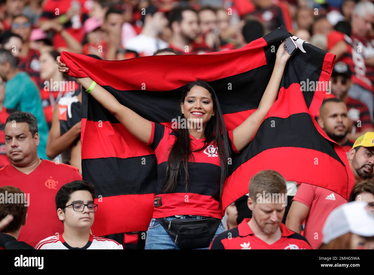 A Flamengo fans holds a team banner at a pre-game watch party at the ...