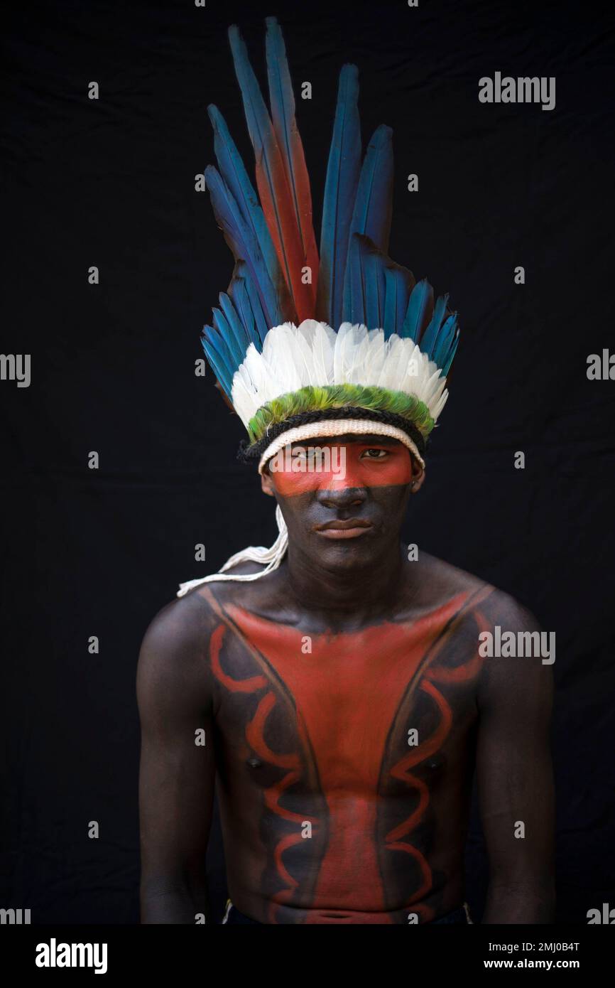 In this Sept. 3, 2019 photo, Gelson Tembe, 21, poses for a portrait ...