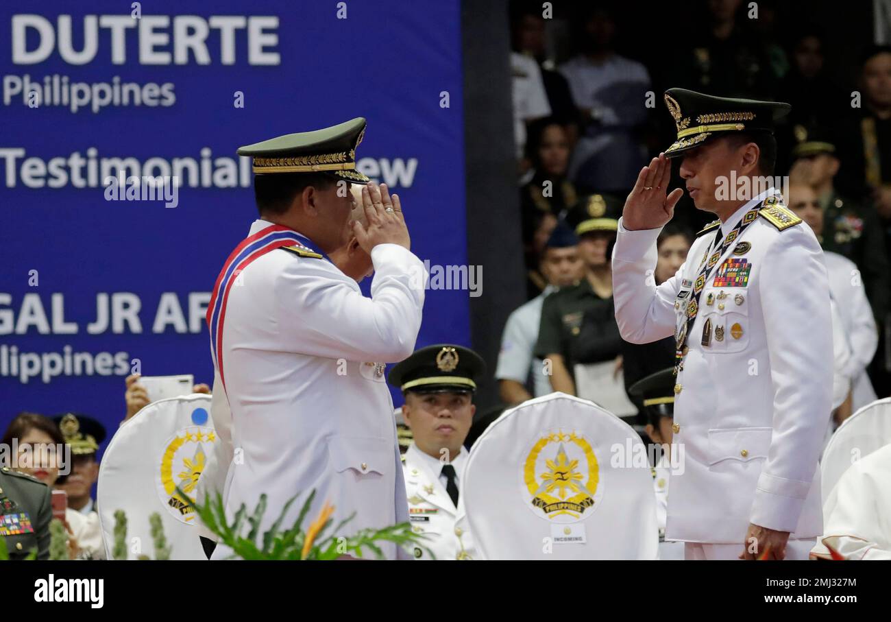 New Philippine Armed Forces chief Lt.Gen. Noel Clement, right, and ...