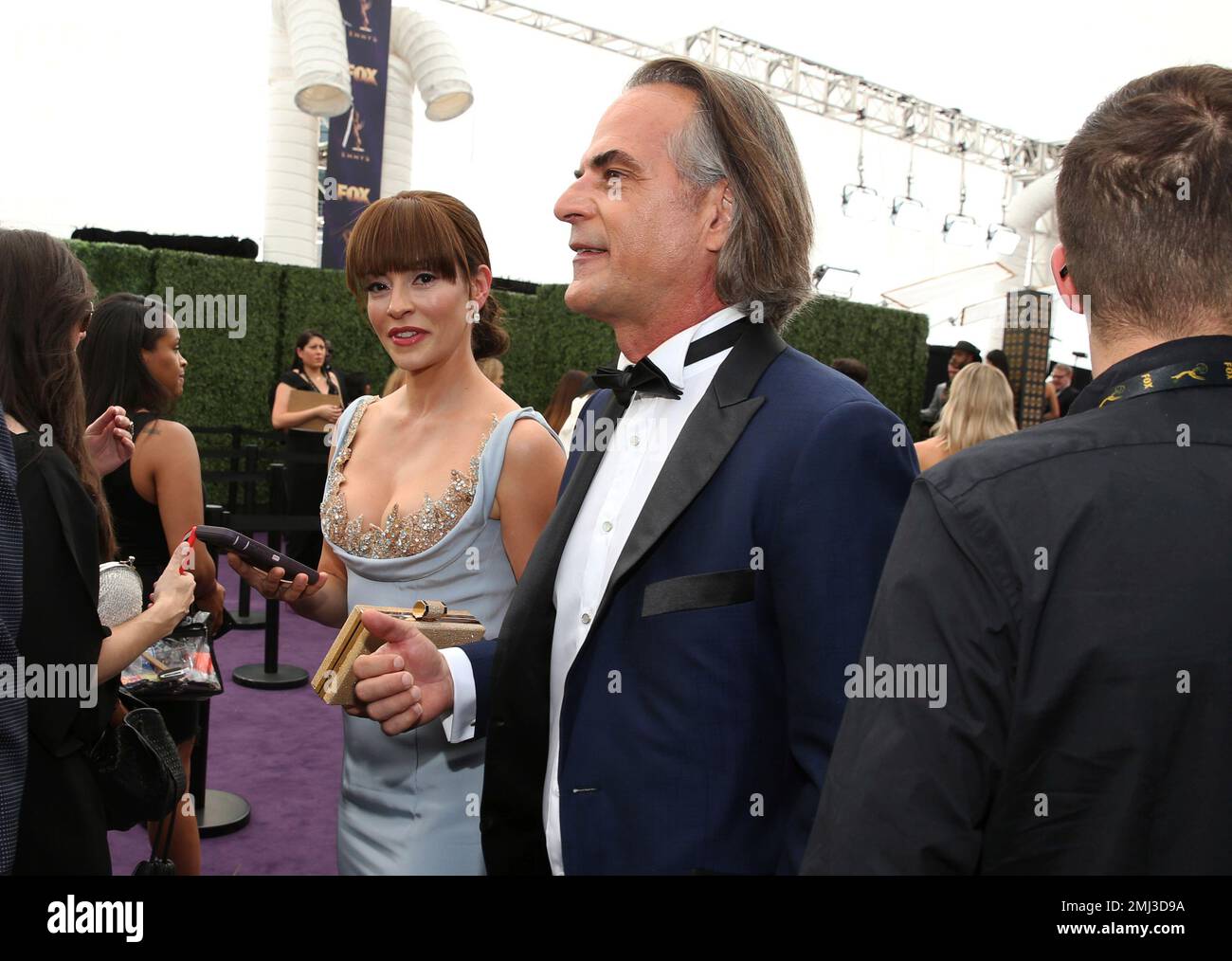 Emmanuelle Vaugier, left, and Vince Calandra arrive at the 71st ...