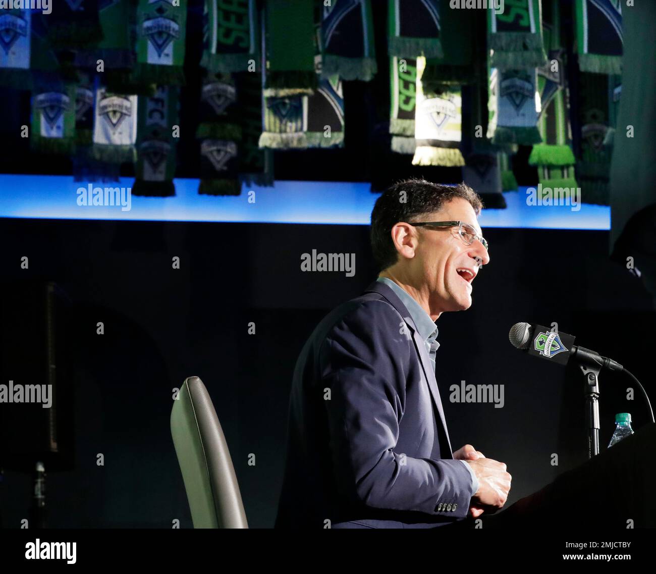 Seattle Sounders majority owner Adrian Hanauer talks to reporters ...