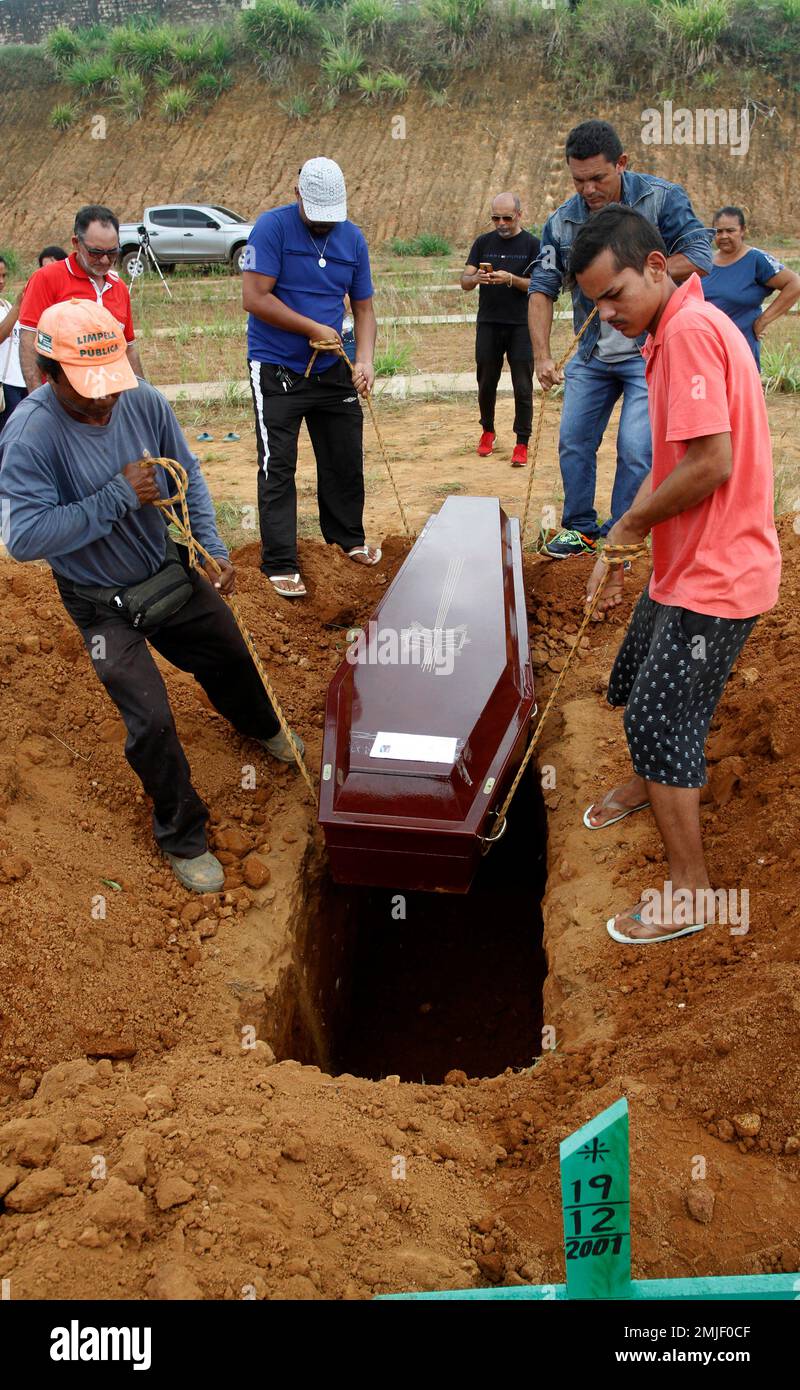 A prisoner who was killed during a riot at a prison is buried in ...