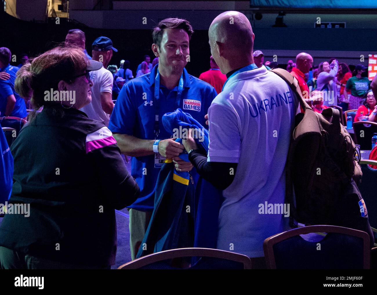 ÉTATS-UNIS Le Sgt Kenneth Guinn (au centre), un athlète des Jeux du ...