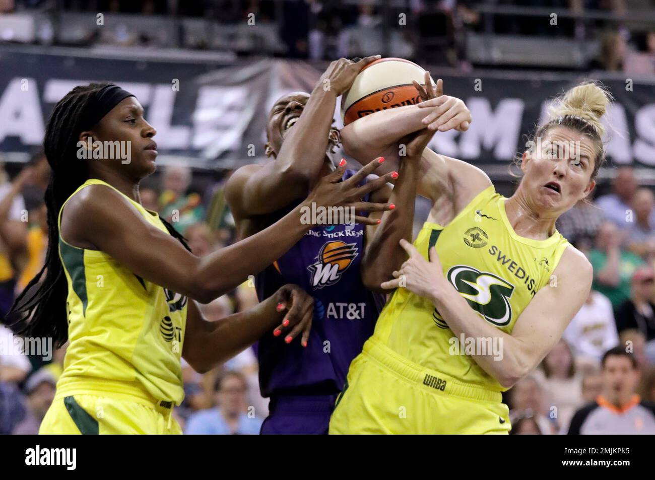 Phoenix Mercury's Sancho Lyttle, center, battles Seattle Storm's ...