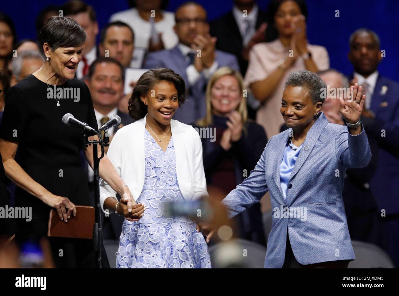 Mayor of Chicago Lori Lightfoot, right, is joined on stage with her ...