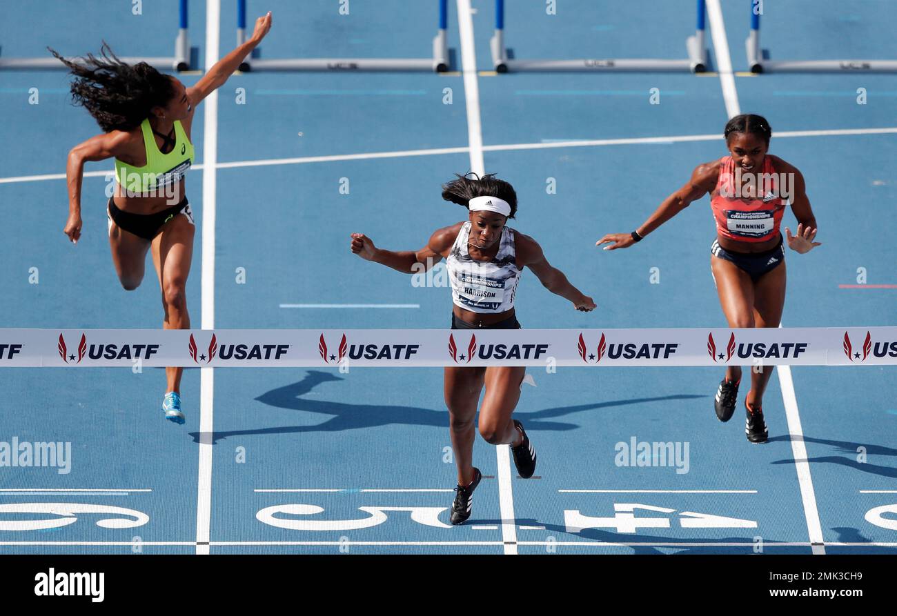 FILE - In this June 23, 2018, file photo, Keni Harrison, center ...