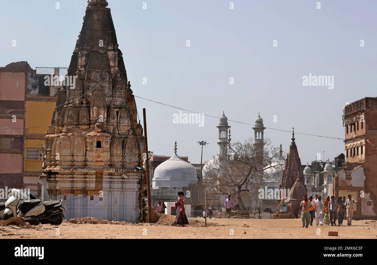 In this March 19, 2019, photo, 17th-century Gyanvapi mosque, white ...