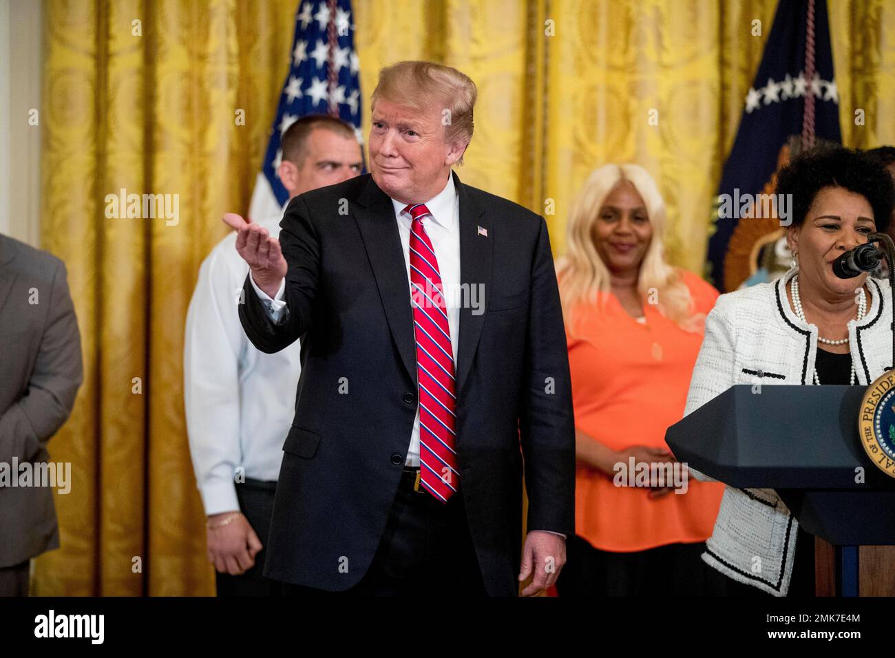 President Donald Trump reacts as Alice Johnson, an inmate whose life ...