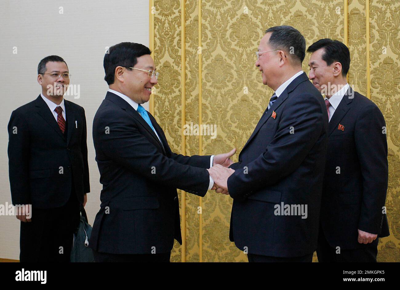 North Korean Foreign Minister Ri Yong Ho, right, welcomes his ...