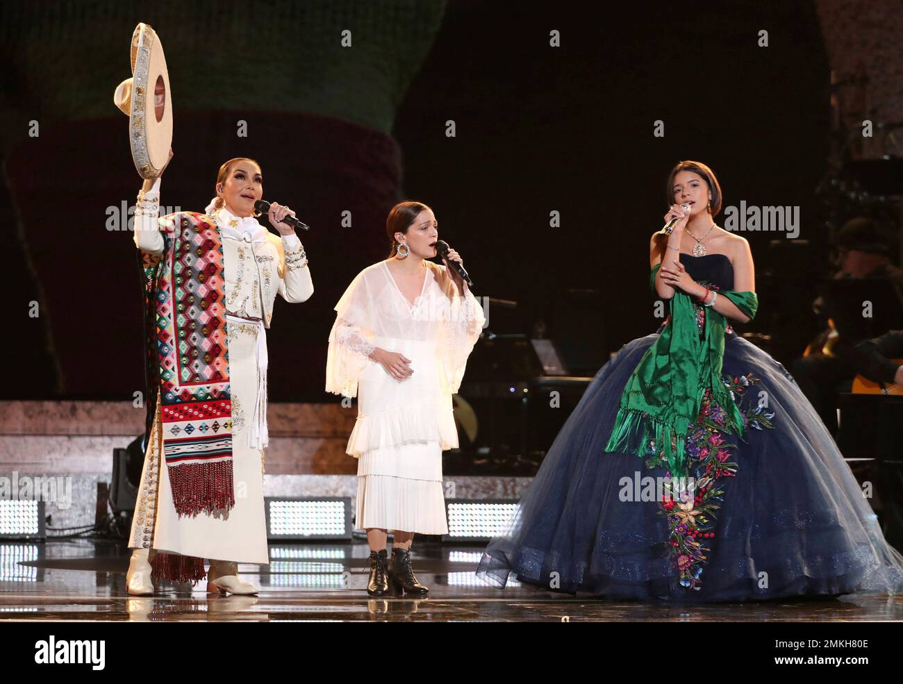 Aida Cuevas, from left, Natalia Lafourcade and Angela Aguilar perform ...