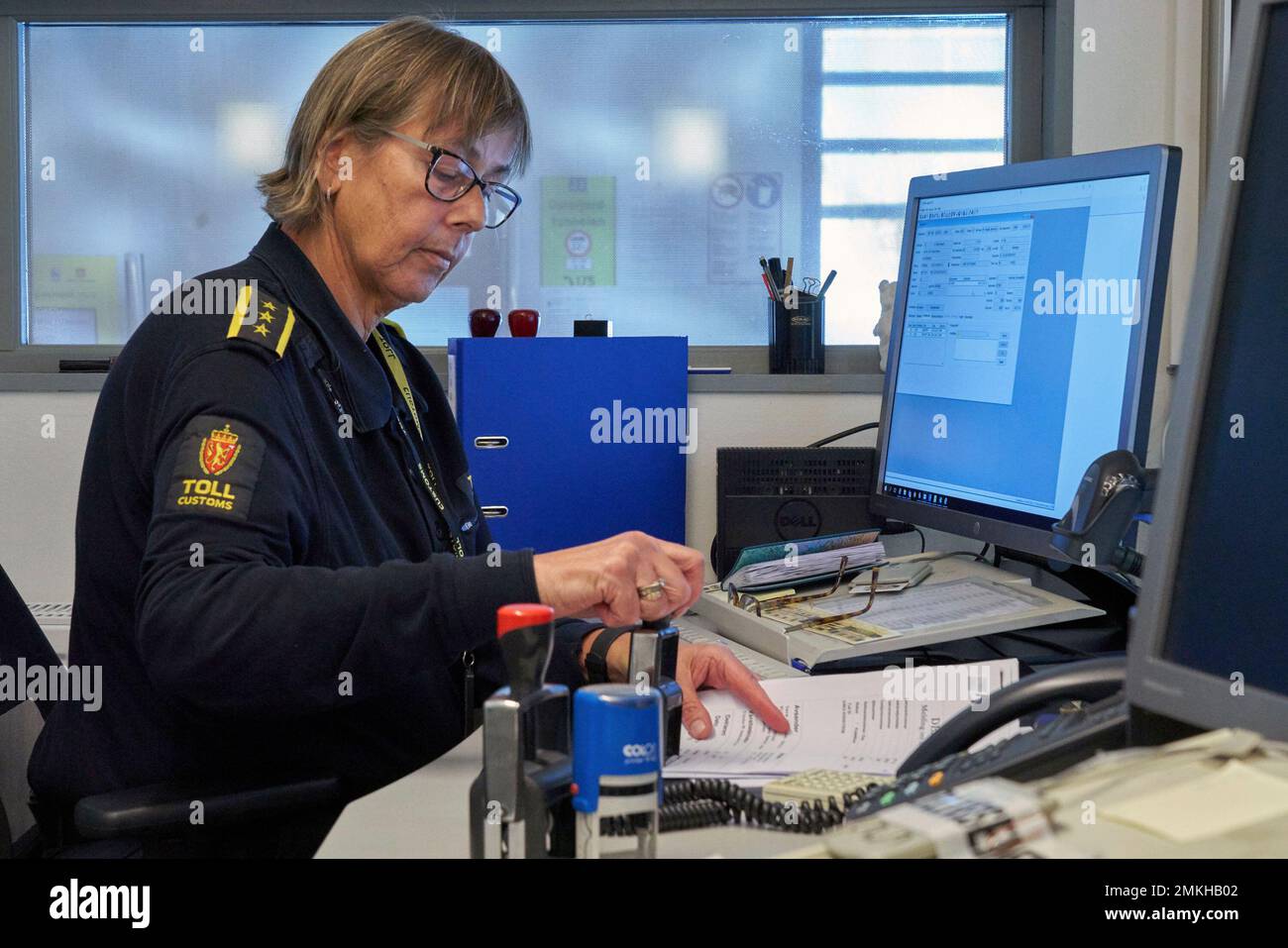 Chief Customs officer Nina Bullock was handling traditional paper ...