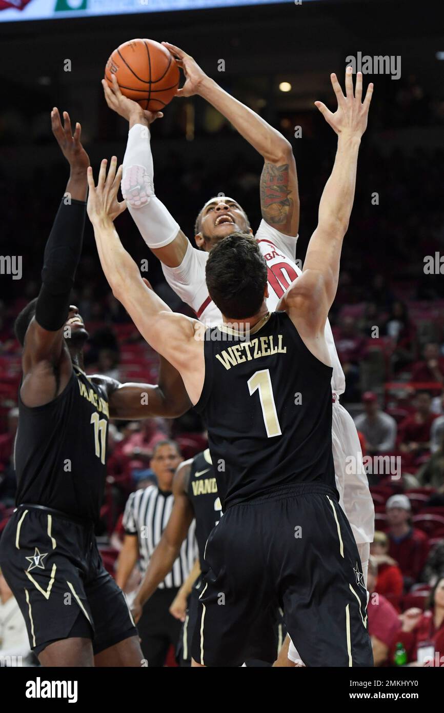 Arkansas forward Daniel Gafford (10) shoots over Vanderbilt defenders ...