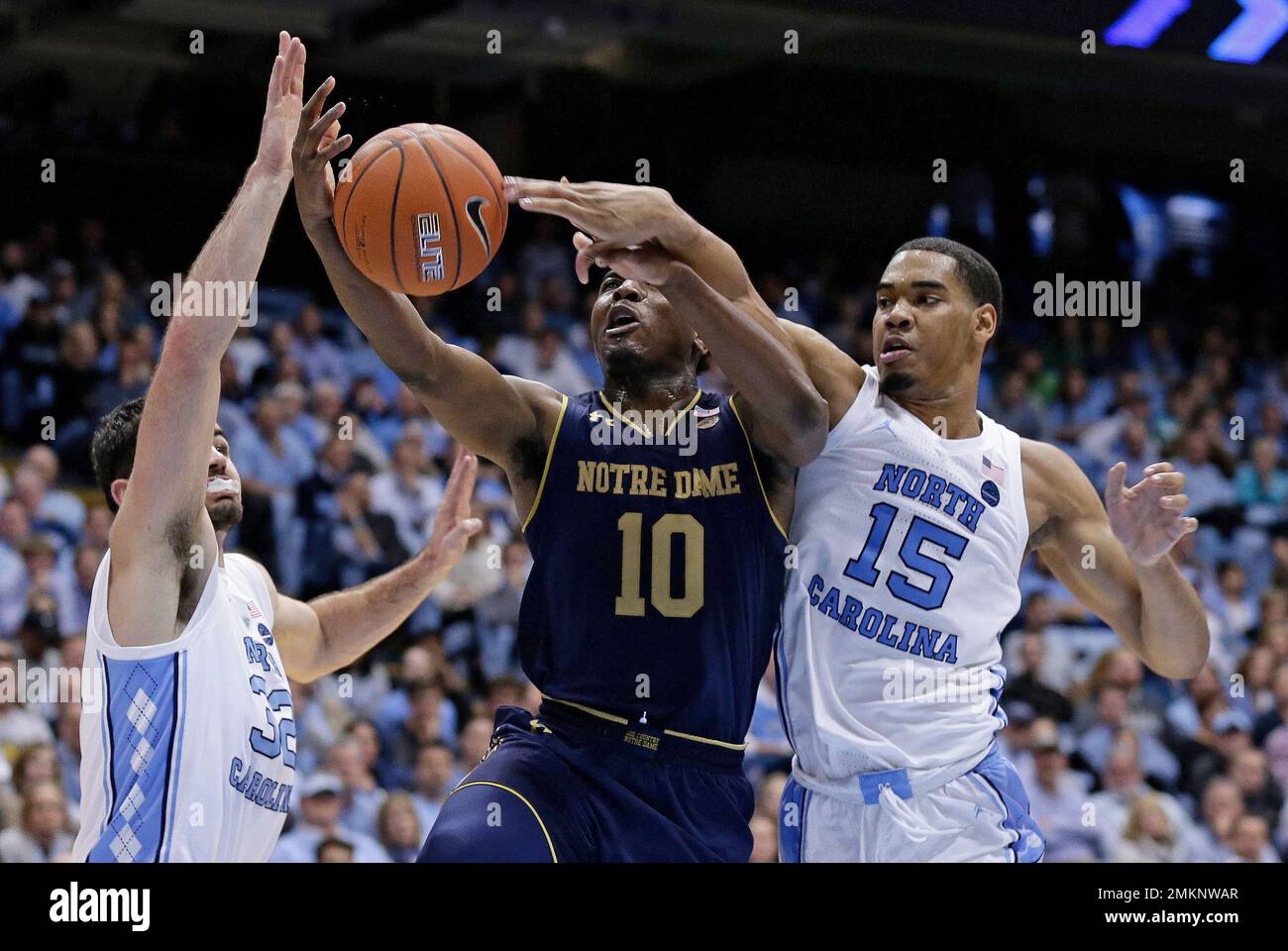 North Carolina's Luke Maye, left, and Garrison Brooks (15) guard Notre ...