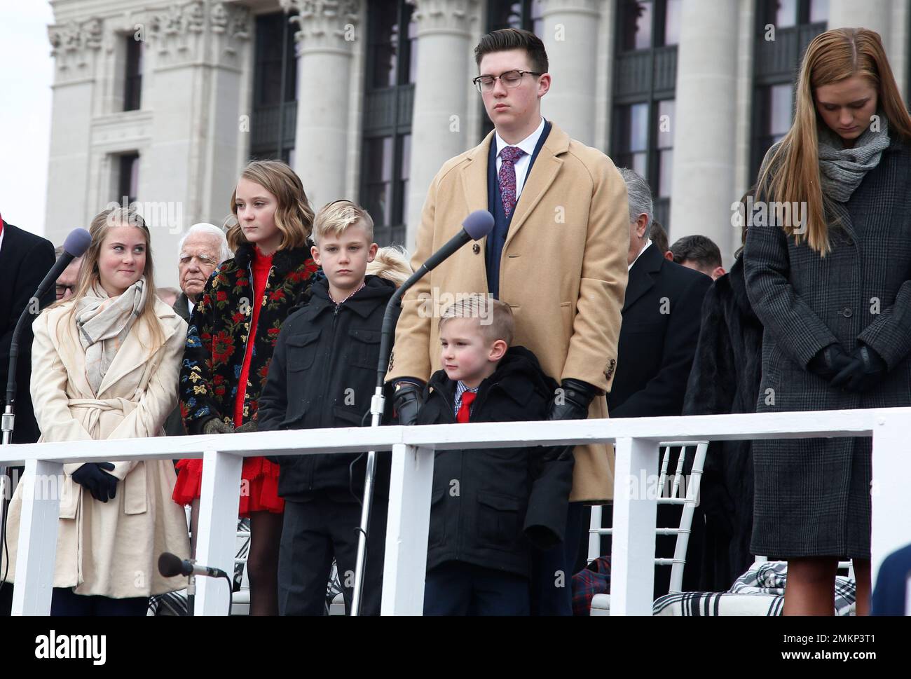 The children of Oklahoma Governor Kevin Stitt stand during the ...