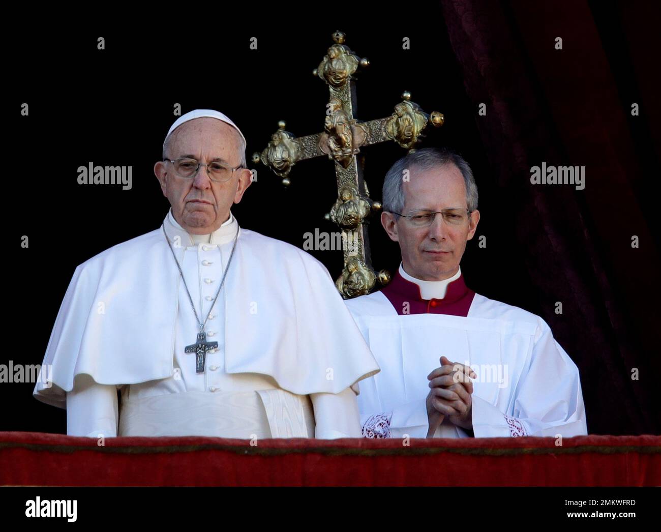 Pope Francis, flanked by Master of Ceremonies Bishop Guido Marini ...