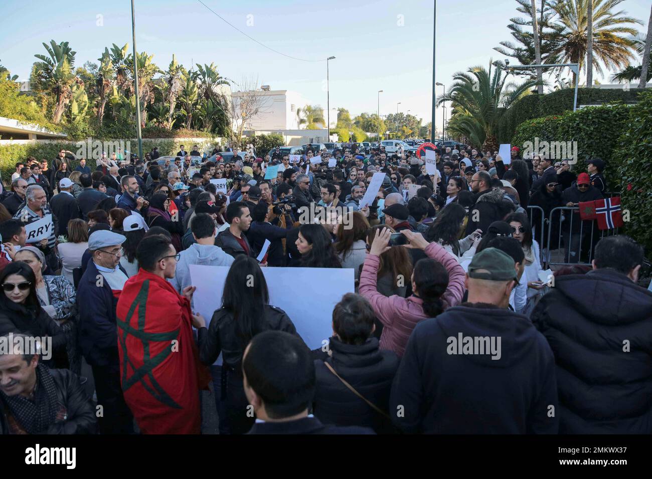 Moroccans gather during a candlelight vigil outside the Norwegian ...