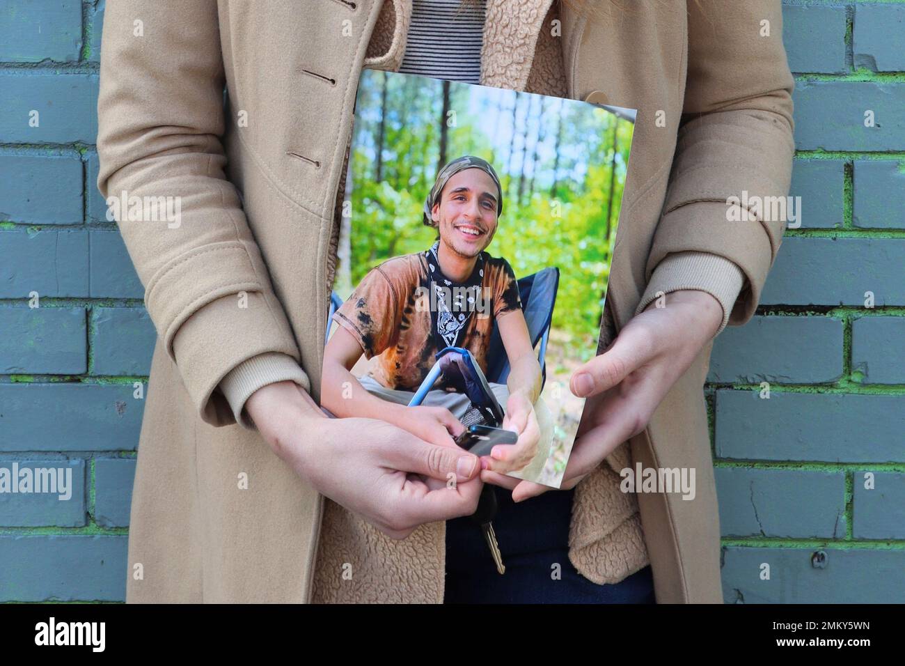 Vienna holds a photo of her slain partner, Tortuguita, in Atlanta on ...