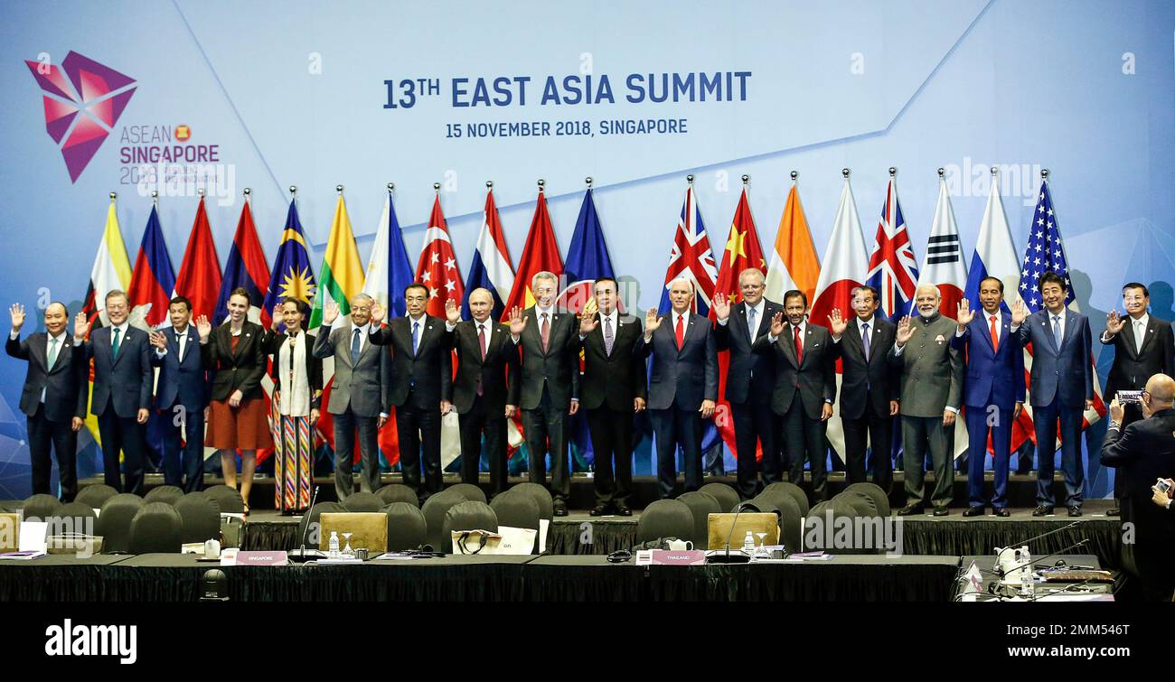 East Asia Summit leaders pose for a group photo during the 13th East ...