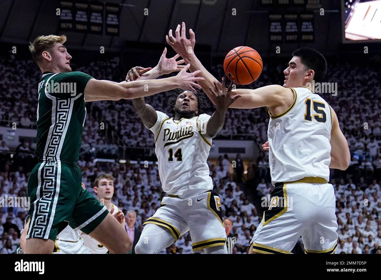 Michigan State center Carson Cooper (15) fights for a rebound with ...