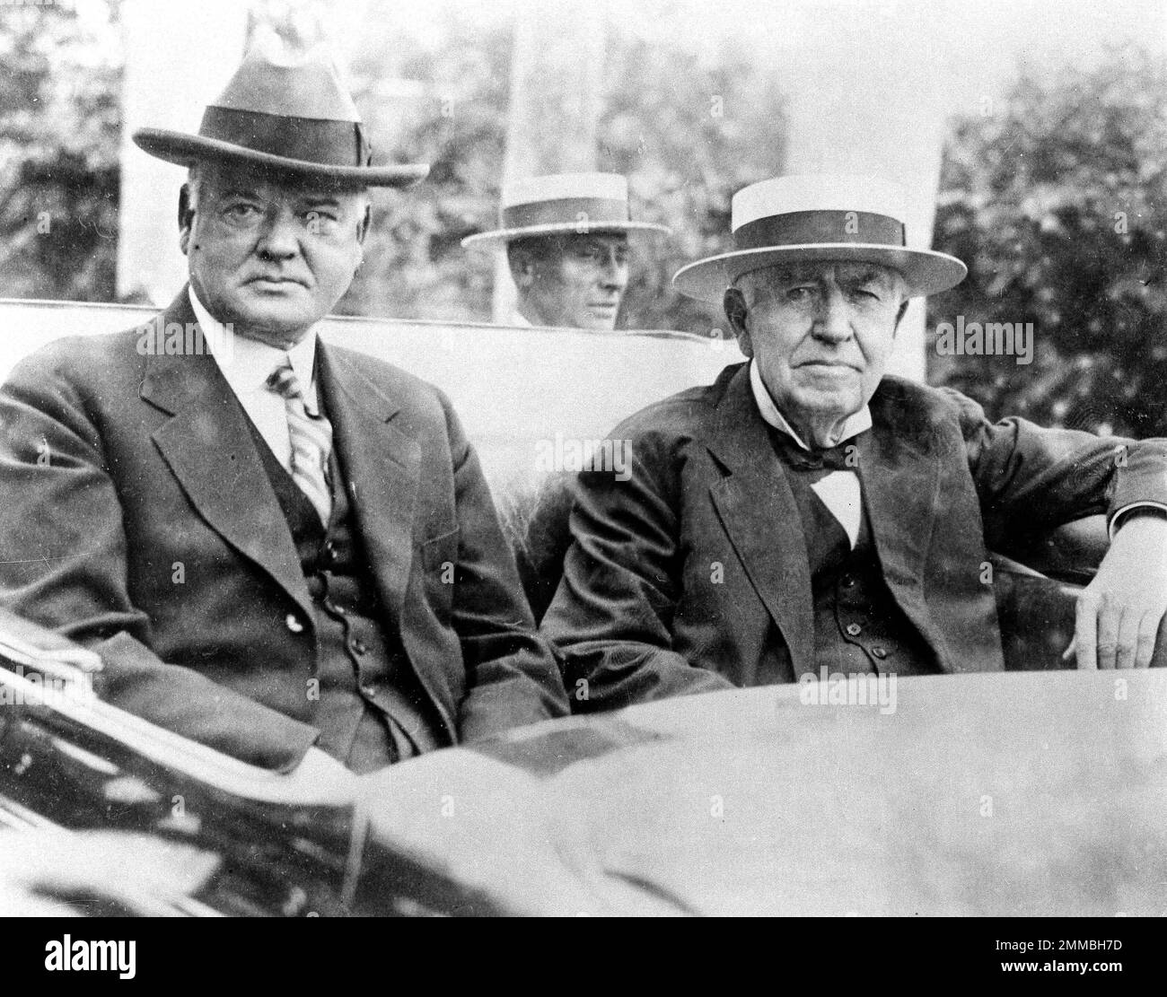 Thomas Alva Edison, right, and President-elect Herbert Hoover ride in a ...